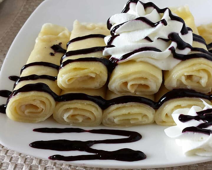 Authentic Nalisniki (Ukrainian Crepes with Cheese Filling)